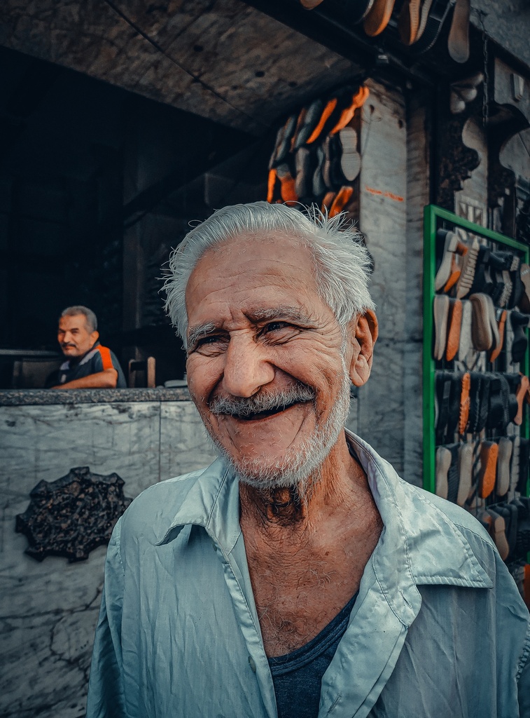 old Egyptian man smiling without teeth | Jini Stock